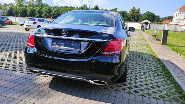 Black Mercedes-Benz C 350 2015 in Kaunas, with an engine capacity of 1.99 L and mileage of 173 thousand km for 13500 €, photo 9 on AUTOMOTO.COM.LV