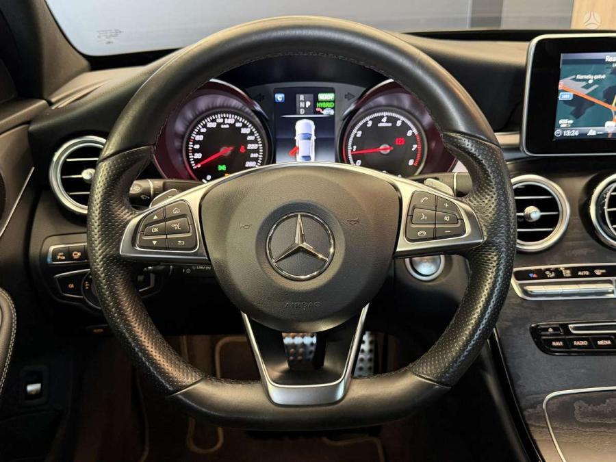 Black Mercedes-Benz C 350 2018 in Kaunas, with an engine capacity of 1.99 L and mileage of 156 thousand km for 17490 €, photo 14 on AUTOMOTO.COM.LV