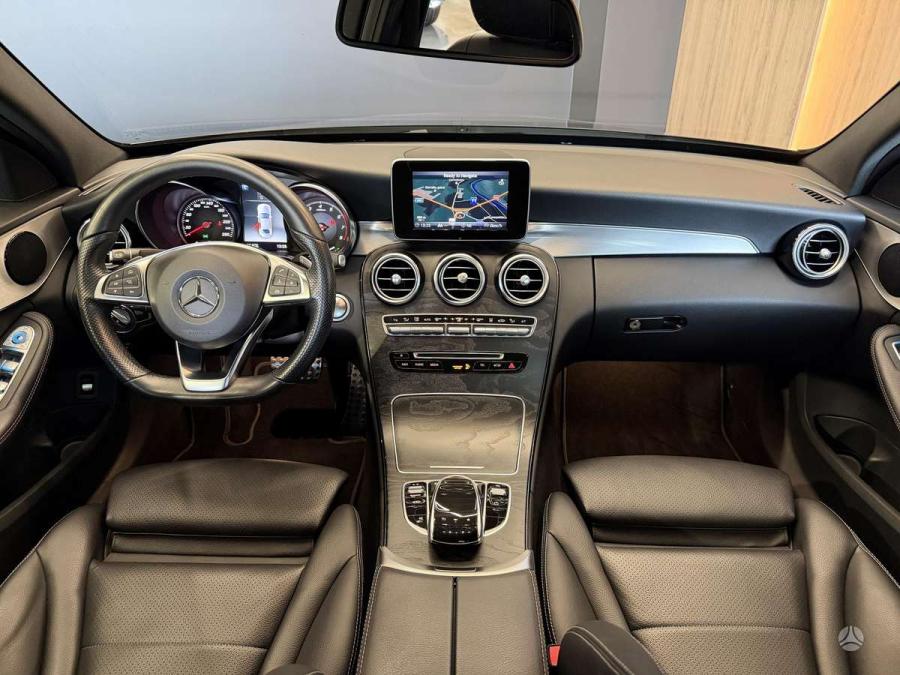 Black Mercedes-Benz C 350 2018 in Kaunas, with an engine capacity of 1.99 L and mileage of 156 thousand km for 17490 €, photo 16 on AUTOMOTO.COM.LV
