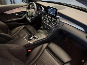 Black Mercedes-Benz C 350 2018 in Kaunas, with an engine capacity of 1.99 L and mileage of 156 thousand km for 17490 €, photo 18 on AUTOMOTO.COM.LV