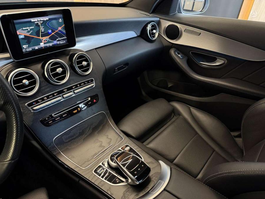 Black Mercedes-Benz C 350 2018 in Kaunas, with an engine capacity of 1.99 L and mileage of 156 thousand km for 17490 €, photo 19 on AUTOMOTO.COM.LV