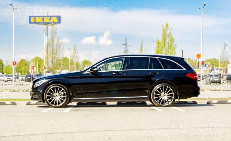 Black Mercedes-Benz C 350 2015 in Riga, with an engine capacity of 2.00 L and mileage of 240 thousand km for 10990 €, photo 5 on AUTOMOTO.COM.LV