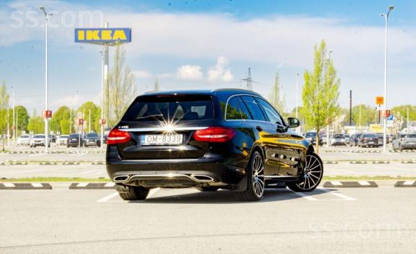 Black Mercedes-Benz C 350 2015 in Riga, with an engine capacity of 2.00 L and mileage of 240 thousand km for 10990 €, photo 5 on AUTOMOTO.COM.LV