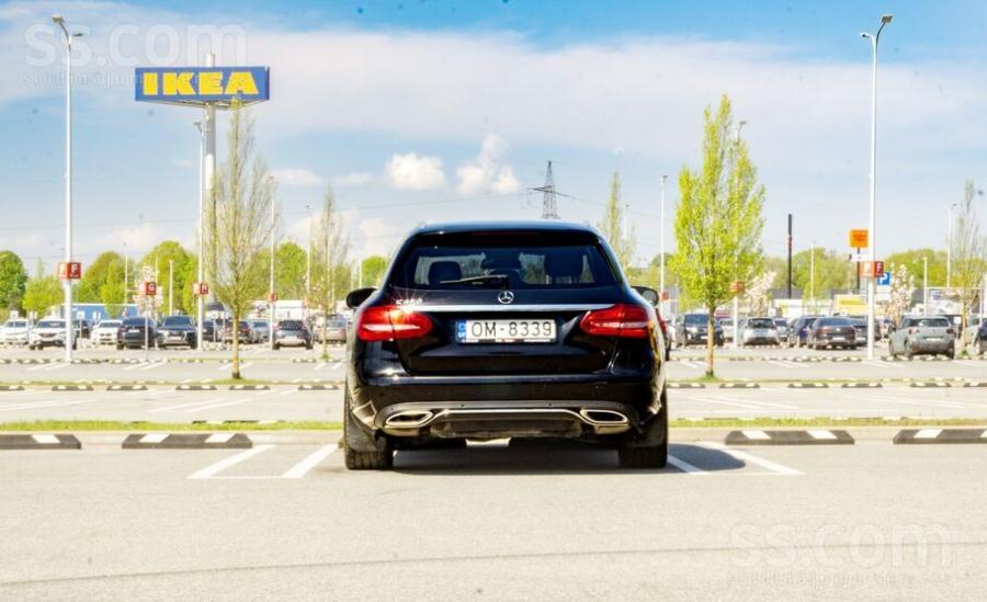 Black Mercedes-Benz C 350 2015 in Riga, with an engine capacity of 2.00 L and mileage of 240 thousand km for 10990 €, photo 7 on AUTOMOTO.COM.LV