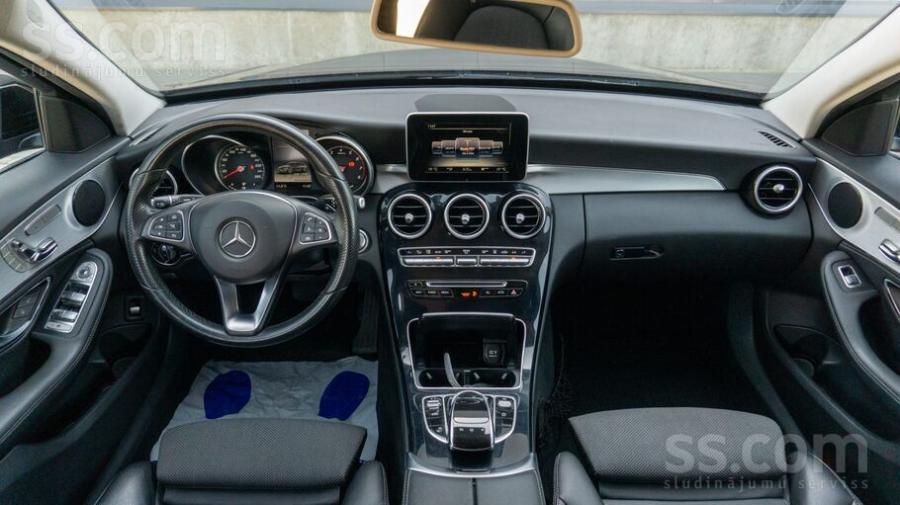 Black Mercedes-Benz C 350 2015 in Riga, with an engine capacity of 2.00 L and mileage of 240 thousand km for 10990 €, photo 12 on AUTOMOTO.COM.LV