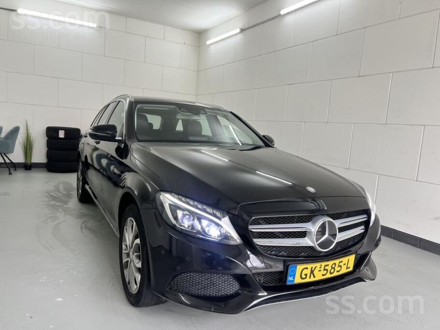 Black Mercedes-Benz C 350 2015 in Limbazi, with an engine capacity of 2.00 L and mileage of 223 thousand km for 11945 €, photo 1 on AUTOMOTO.COM.LV