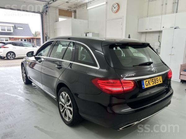Black Mercedes-Benz C 350 2015 in Limbazi, with an engine capacity of 2.00 L and mileage of 223 thousand km for 11945 €, photo 4 on AUTOMOTO.COM.LV
