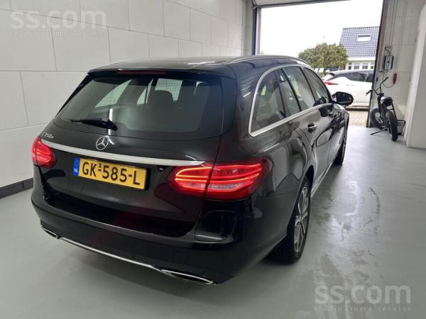 Black Mercedes-Benz C 350 2015 in Limbazi, with an engine capacity of 2.00 L and mileage of 223 thousand km for 11945 €, photo 5 on AUTOMOTO.COM.LV