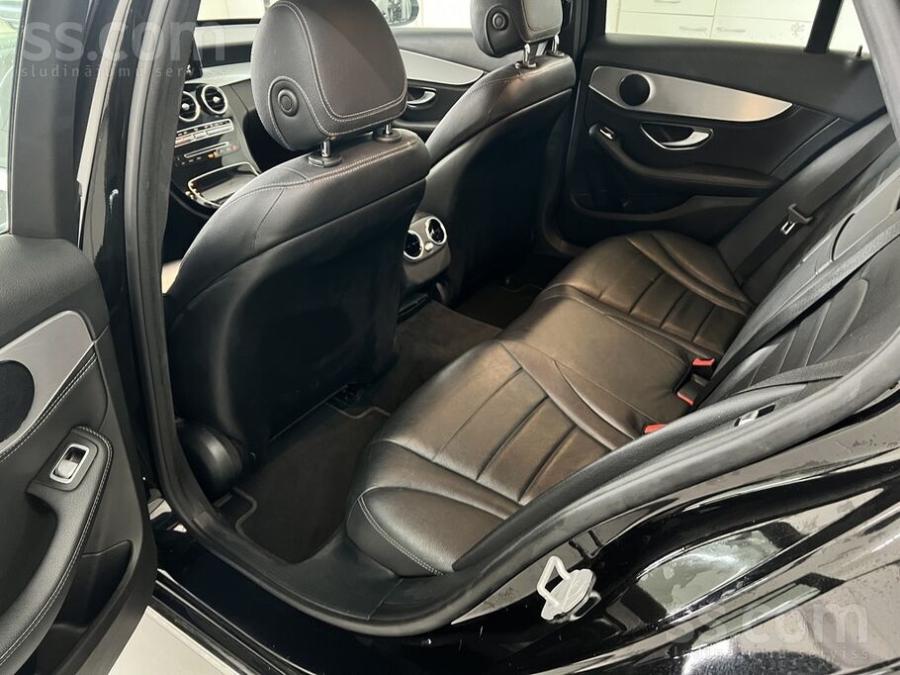 Black Mercedes-Benz C 350 2015 in Limbazi, with an engine capacity of 2.00 L and mileage of 223 thousand km for 11945 €, photo 10 on AUTOMOTO.COM.LV