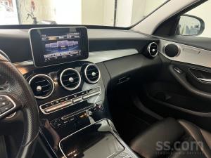 Black Mercedes-Benz C 350 2015 in Limbazi, with an engine capacity of 2.00 L and mileage of 223 thousand km for 11945 €, photo 12 on AUTOMOTO.COM.LV