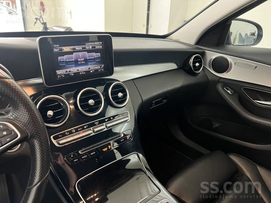 Black Mercedes-Benz C 350 2015 in Limbazi, with an engine capacity of 2.00 L and mileage of 223 thousand km for 11945 €, photo 12 on AUTOMOTO.COM.LV