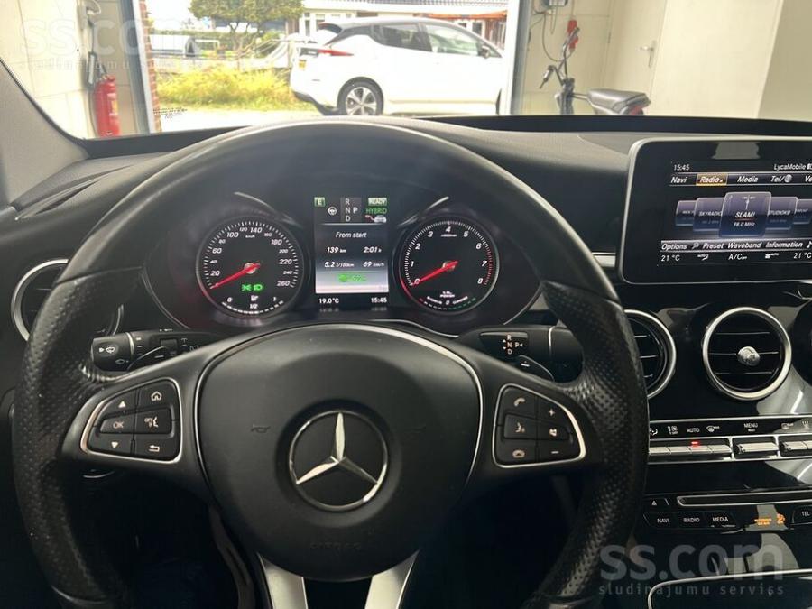 Black Mercedes-Benz C 350 2015 in Limbazi, with an engine capacity of 2.00 L and mileage of 223 thousand km for 11945 €, photo 13 on AUTOMOTO.COM.LV