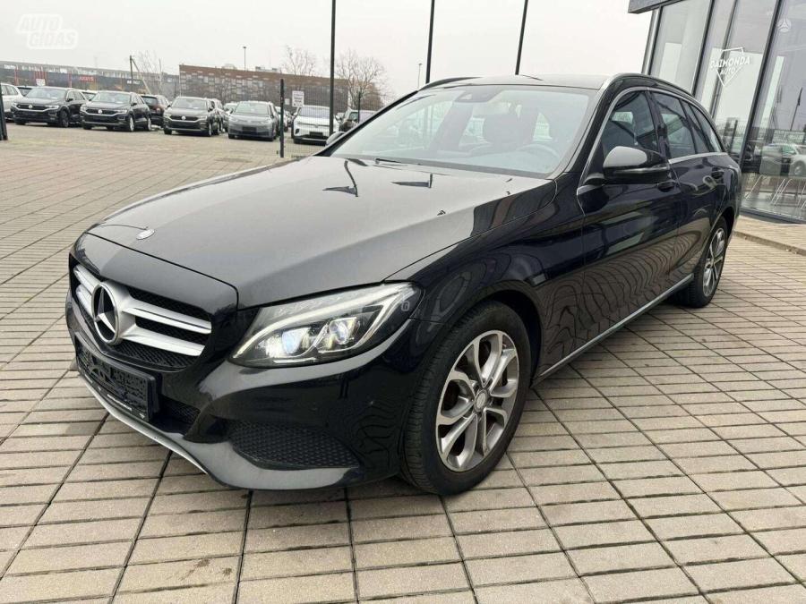 Black Mercedes-Benz C 350 2016 in Kaunas, with an engine capacity of 2.00 L and mileage of 216 thousand km for 11900 €, photo 1 on AUTOMOTO.COM.LV