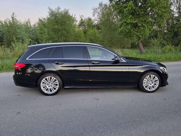 Black Mercedes-Benz C 350 2016 in Kaunas, with an engine capacity of 1.99 L and mileage of 255 thousand km for 9750 €, photo 4 on AUTOMOTO.COM.LV