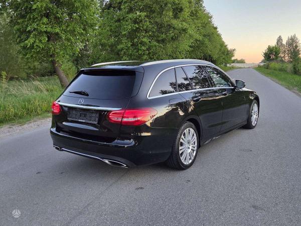 Black Mercedes-Benz C 350 2016 in Kaunas, with an engine capacity of 1.99 L and mileage of 255 thousand km for 9750 €, photo 5 on AUTOMOTO.COM.LV