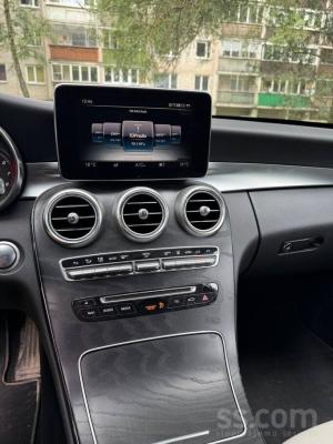 Black Mercedes-Benz C 350 2017 in Riga, with an engine capacity of 2.00 L and mileage of 227 thousand km for 12400 €, photo 6 on AUTOMOTO.COM.LV