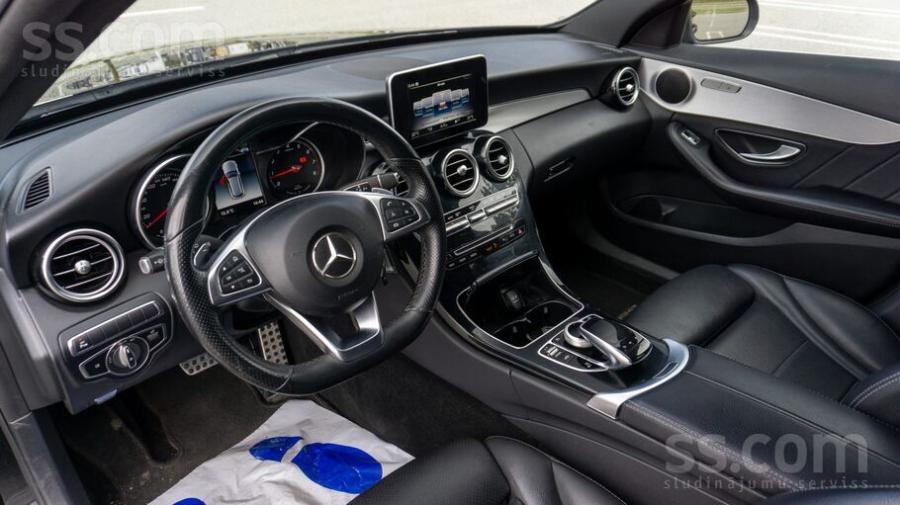 Black Mercedes-Benz C 350 2018 in Riga, with an engine capacity of 2.00 L and mileage of 202 thousand km for 11490 €, photo 11 on AUTOMOTO.COM.LV