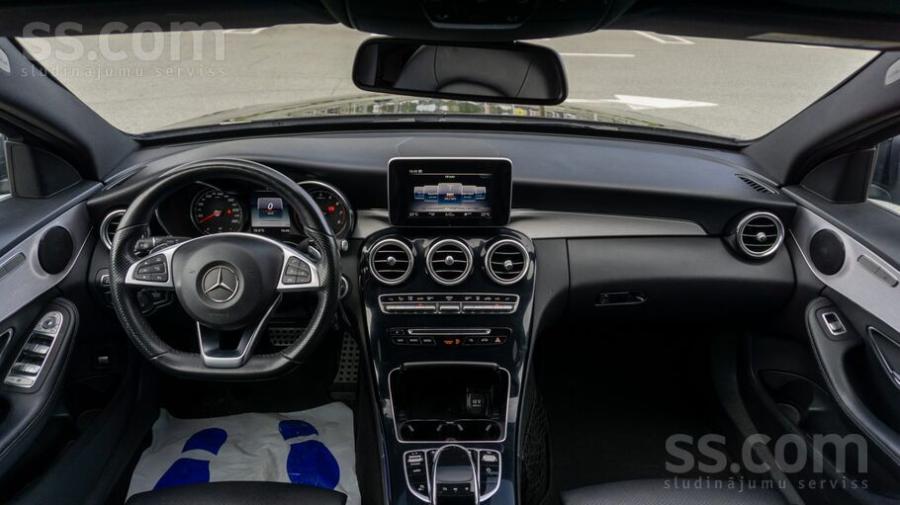 Black Mercedes-Benz C 350 2018 in Riga, with an engine capacity of 2.00 L and mileage of 202 thousand km for 11490 €, photo 13 on AUTOMOTO.COM.LV