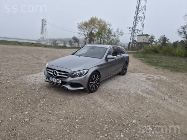 Grey Mercedes-Benz C 350 2015 in Liepaja, with an engine capacity of 2.00 L and mileage of 233 thousand km for 12500 €, photo 1 on AUTOMOTO.COM.LV