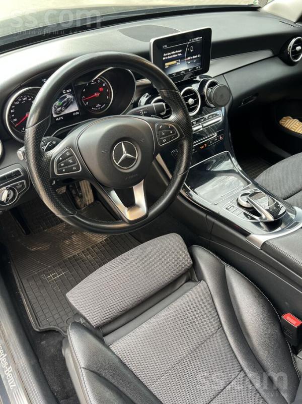 Grey Mercedes-Benz C 350 2015 in Riga, with an engine capacity of 2.00 L and mileage of 219 thousand km for 13990 €, photo 10 on AUTOMOTO.COM.LV
