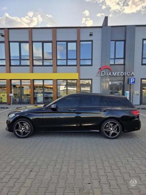 Black Mercedes-Benz c-400 2016 in Vilnius, with an engine capacity of 3.00 L and mileage of 455 thousand km for 13500 €, photo  on AUTOMOTO.COM.LV