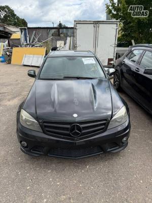 Black Mercedes-Benz C 63 AMG 2008 in Kaunas, with an engine capacity of 6.20 L and mileage of 239 thousand km for 10500 €, photo  on AUTOMOTO.COM.LV