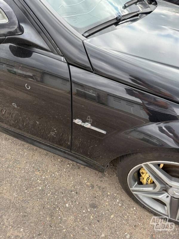 Мерседес Ц 63 АМГ 2008 в Каунас на AUTOMOTO.COM.LV Черный Мерседес Ц 63 АМГ 2008 в Каунас, объемом двигателя 6.20 л и пробегом 239 тыс. км за 10500 €, фото 9 на AUTOMOTO.COM.LV