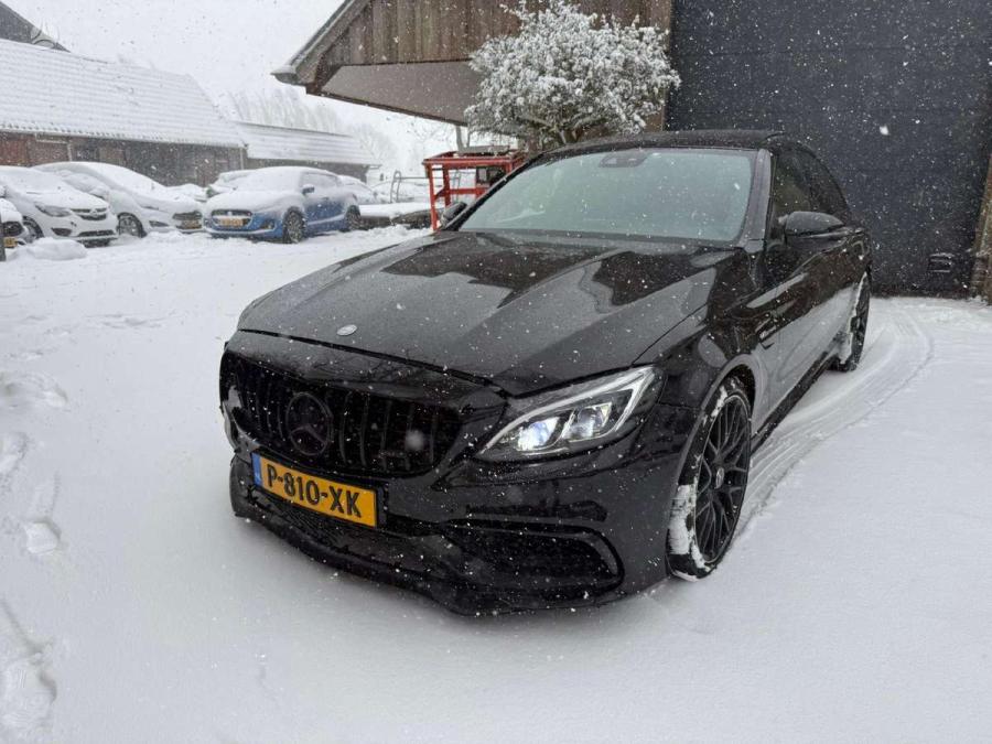 Black Mercedes-Benz C 63 AMG 2015 in Marijampole, with an engine capacity of 3.98 L and mileage of 200 thousand km for 26500 €, photo 2 on AUTOMOTO.COM.LV