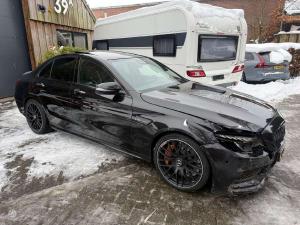 Black Mercedes-Benz C 63 AMG 2015 in Marijampole, with an engine capacity of 3.98 L and mileage of 200 thousand km for 26500 €, photo 6 on AUTOMOTO.COM.LV