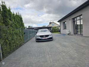 Grey Mercedes-Benz C 63 AMG 2020 in Panevezys, with an engine capacity of 3.98 L and mileage of 71 thousand km for 37000 €, photo 4 on AUTOMOTO.COM.LV