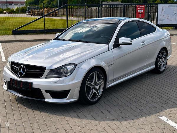 Grey Mercedes-Benz C 63 AMG 2012 in Panevezys, with an engine capacity of 6.30 L and mileage of 106 thousand km for 31000 €, photo 2 on AUTOMOTO.COM.LV