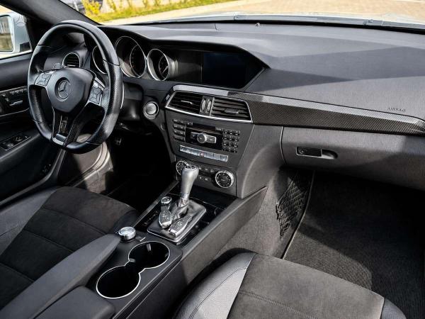 Grey Mercedes-Benz C 63 AMG 2012 in Panevezys, with an engine capacity of 6.30 L and mileage of 106 thousand km for 31000 €, photo 8 on AUTOMOTO.COM.LV