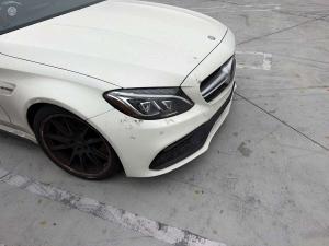 White Mercedes-Benz C 63 AMG 2017 in Kaunas, with an engine capacity of 4.00 L and mileage of 81 thousand km for 36500 €, photo 13 on AUTOMOTO.COM.LV