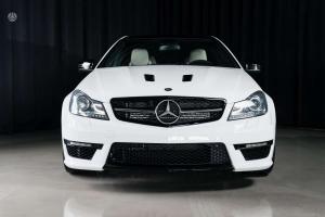 White Mercedes-Benz C 63 AMG 2014 in Vilnius, with an engine capacity of 6.21 L and mileage of 23 thousand km for 48998 €, photo 3 on AUTOMOTO.COM.LV