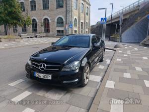 Black Mercedes-Benz C-Class 2013 in Tallinn, with an engine capacity of 2.10 L and mileage of 195 thousand km for 9900 €, photo  on AUTOMOTO.COM.LV