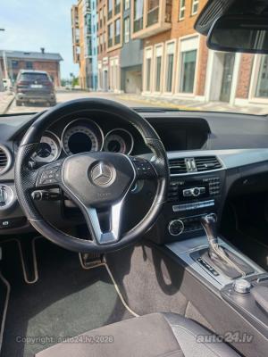 Black Mercedes-Benz C-Class 2013 in Tallinn, with an engine capacity of 2.10 L and mileage of 195 thousand km for 9900 €, photo 10 on AUTOMOTO.COM.LV