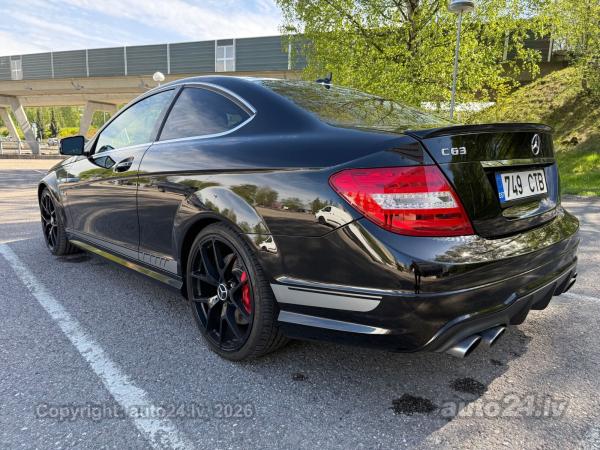 Black Mercedes-Benz C-Class 2014 in Tallinn, with an engine capacity of 6.20 L and mileage of 116 thousand km for 36900 €, photo 6 on AUTOMOTO.COM.LV