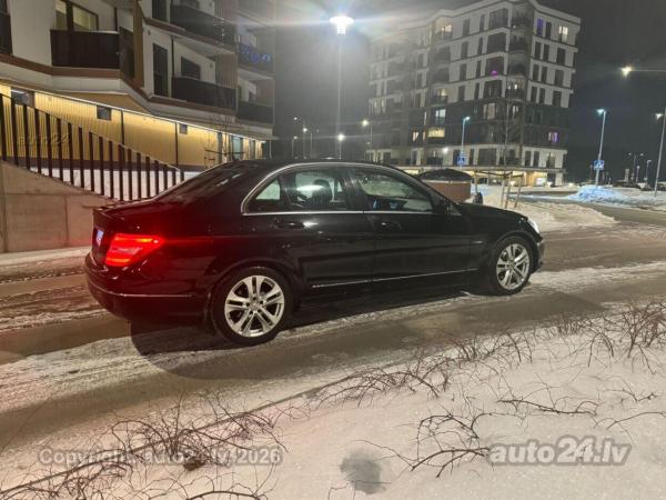 Black Mercedes-Benz C-Class 2011 in Tallinn, with an engine capacity of 1.80 L and mileage of 127 thousand km for 6899 €, photo 3 on AUTOMOTO.COM.LV