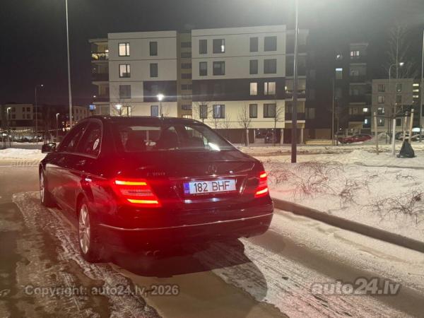 Black Mercedes-Benz C-Class 2011 in Tallinn, with an engine capacity of 1.80 L and mileage of 127 thousand km for 6899 €, photo 4 on AUTOMOTO.COM.LV