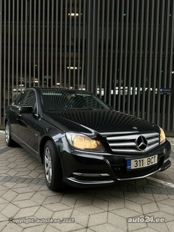 Black Mercedes-Benz C-Class 2012 in Tallinn, with an engine capacity of 2.10 L and mileage of 350 thousand km for 7000 €, photo 1 on AUTOMOTO.COM.LV