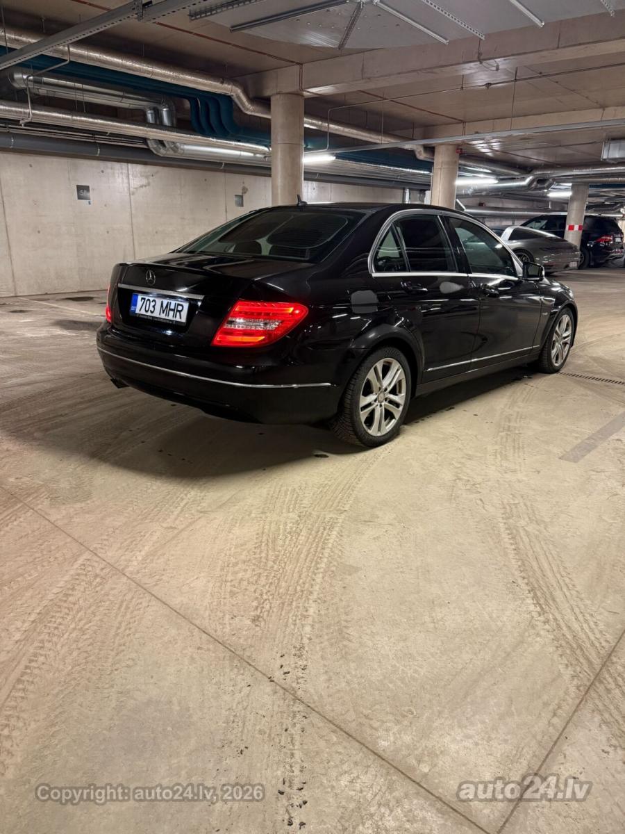 Black Mercedes-Benz C-Class 2012 in Tallinn, with an engine capacity of 1.80 L and mileage of 176 thousand km for 8000 €, photo 7 on AUTOMOTO.COM.LV