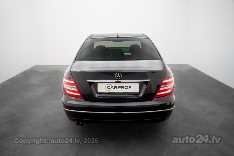 Black Mercedes-Benz C-Class 2012 in Tallinn, with an engine capacity of 1.80 L and mileage of 149 thousand km for 9999 €, photo 6 on AUTOMOTO.COM.LV