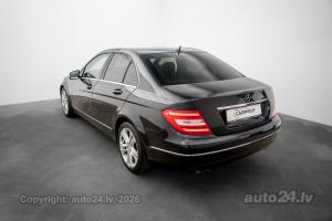 Black Mercedes-Benz C-Class 2012 in Tallinn, with an engine capacity of 1.80 L and mileage of 149 thousand km for 9999 €, photo 7 on AUTOMOTO.COM.LV