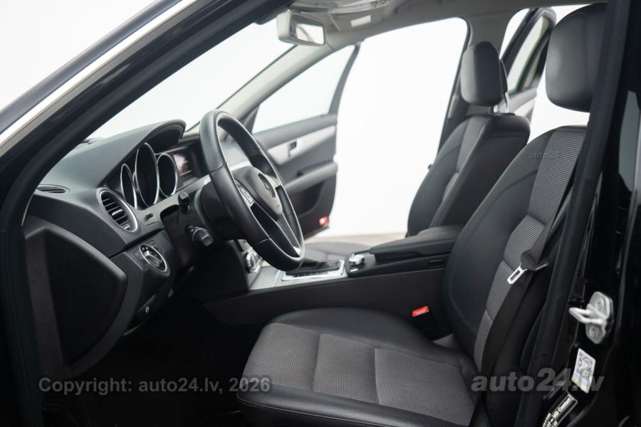 Black Mercedes-Benz C-Class 2012 in Tallinn, with an engine capacity of 1.80 L and mileage of 149 thousand km for 9999 €, photo 9 on AUTOMOTO.COM.LV