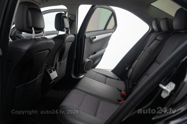 Black Mercedes-Benz C-Class 2012 in Tallinn, with an engine capacity of 1.80 L and mileage of 149 thousand km for 9999 €, photo 9 on AUTOMOTO.COM.LV