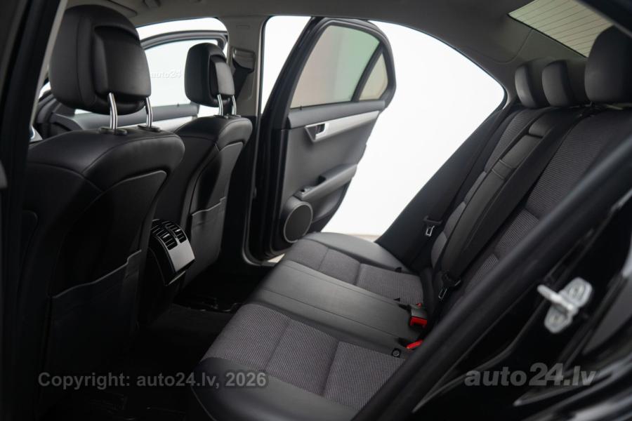 Black Mercedes-Benz C-Class 2012 in Tallinn, with an engine capacity of 1.80 L and mileage of 149 thousand km for 9999 €, photo 10 on AUTOMOTO.COM.LV
