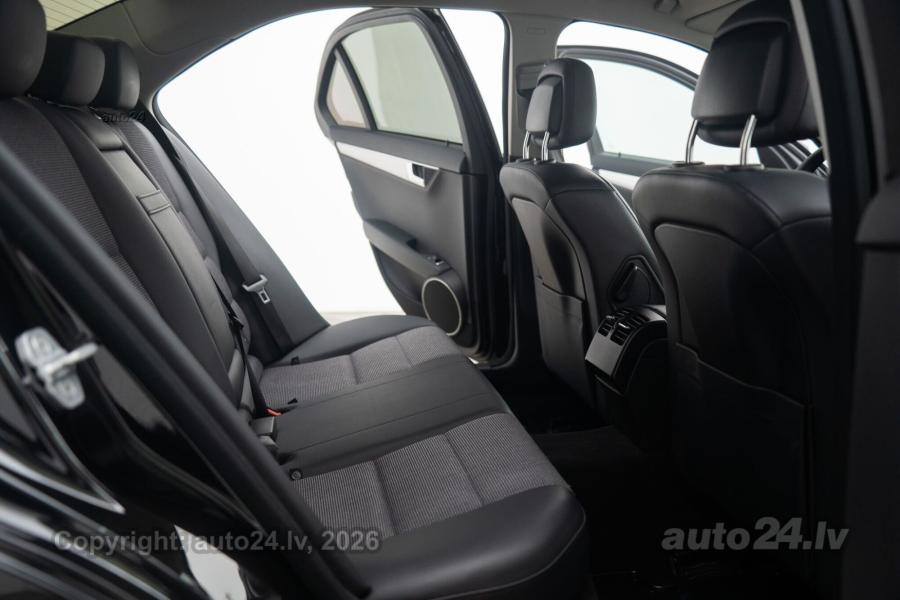 Black Mercedes-Benz C-Class 2012 in Tallinn, with an engine capacity of 1.80 L and mileage of 149 thousand km for 9999 €, photo 11 on AUTOMOTO.COM.LV