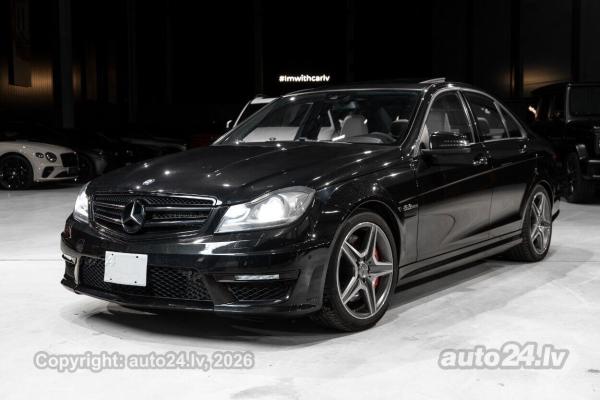 Black Mercedes-Benz C-Class 2013 in Riga, with an engine capacity of 6.20 L and mileage of 182 thousand km for 32000 €, photo 1 on AUTOMOTO.COM.LV