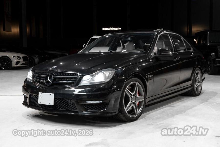Black Mercedes-Benz C-Class 2013 in Riga, with an engine capacity of 6.20 L and mileage of 182 thousand km for 32000 €, photo 1 on AUTOMOTO.COM.LV