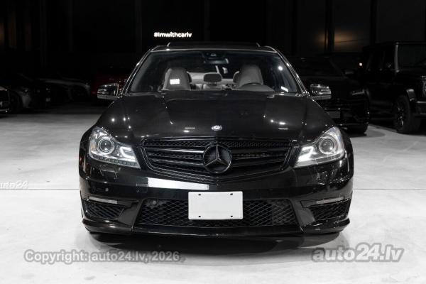 Black Mercedes-Benz C-Class 2013 in Riga, with an engine capacity of 6.20 L and mileage of 182 thousand km for 32000 €, photo 2 on AUTOMOTO.COM.LV